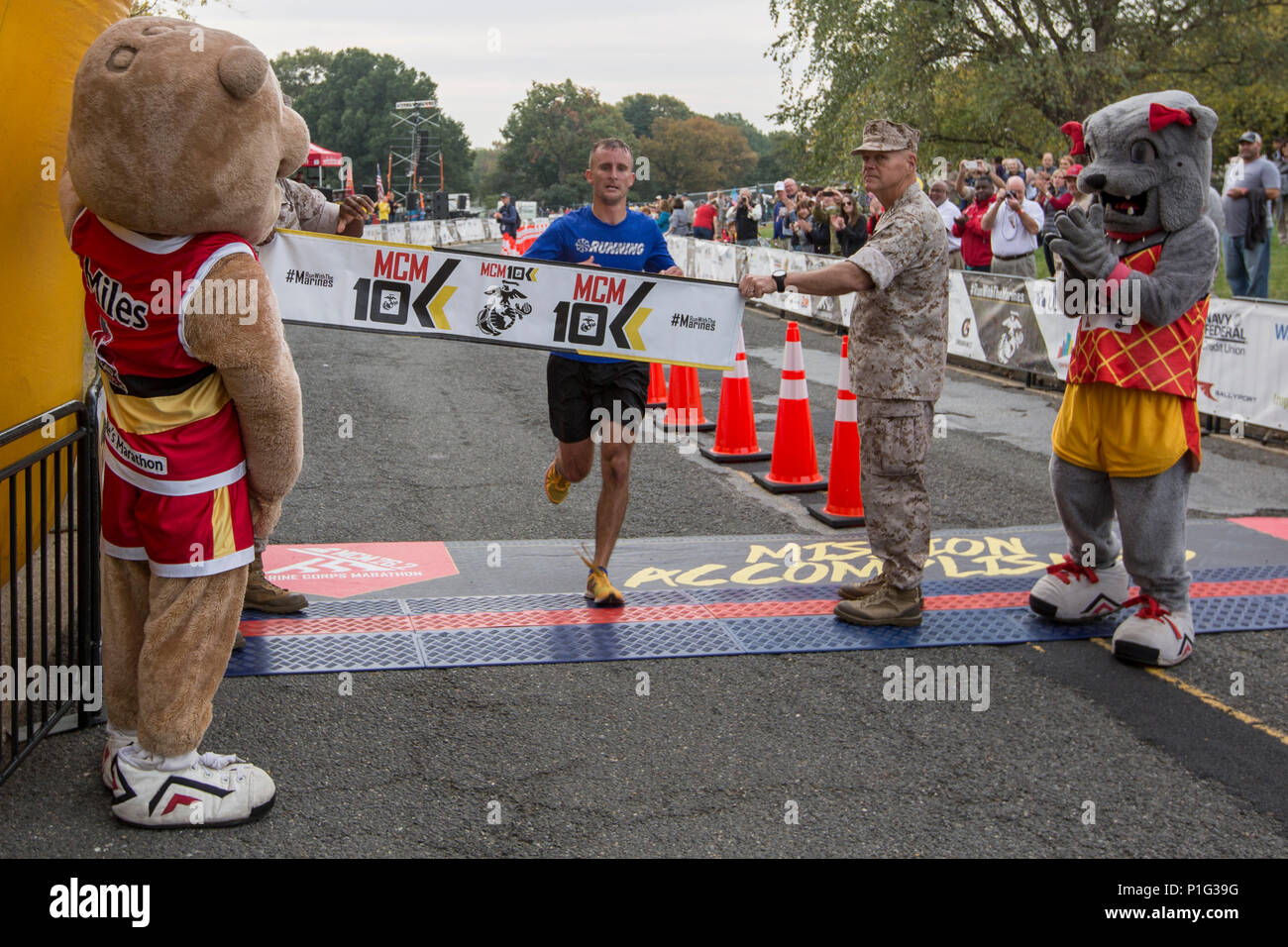Geophery Mills, first place finisher of the 8th Marine Corps Marathon ...