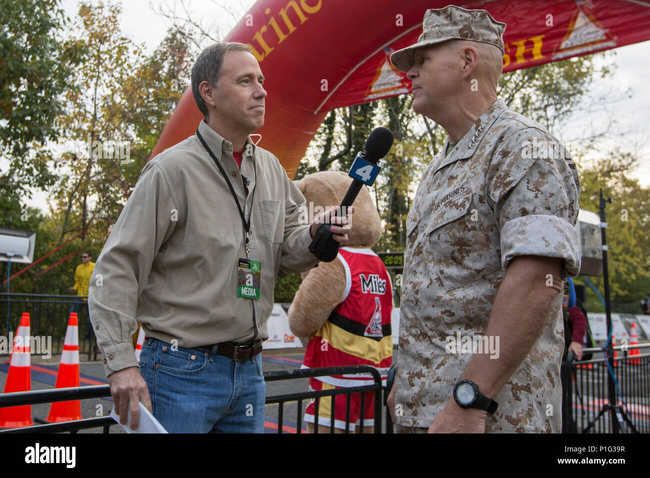 Commandant of the Marine Corps Gen. Robert B. Neller, right, speaks to ...