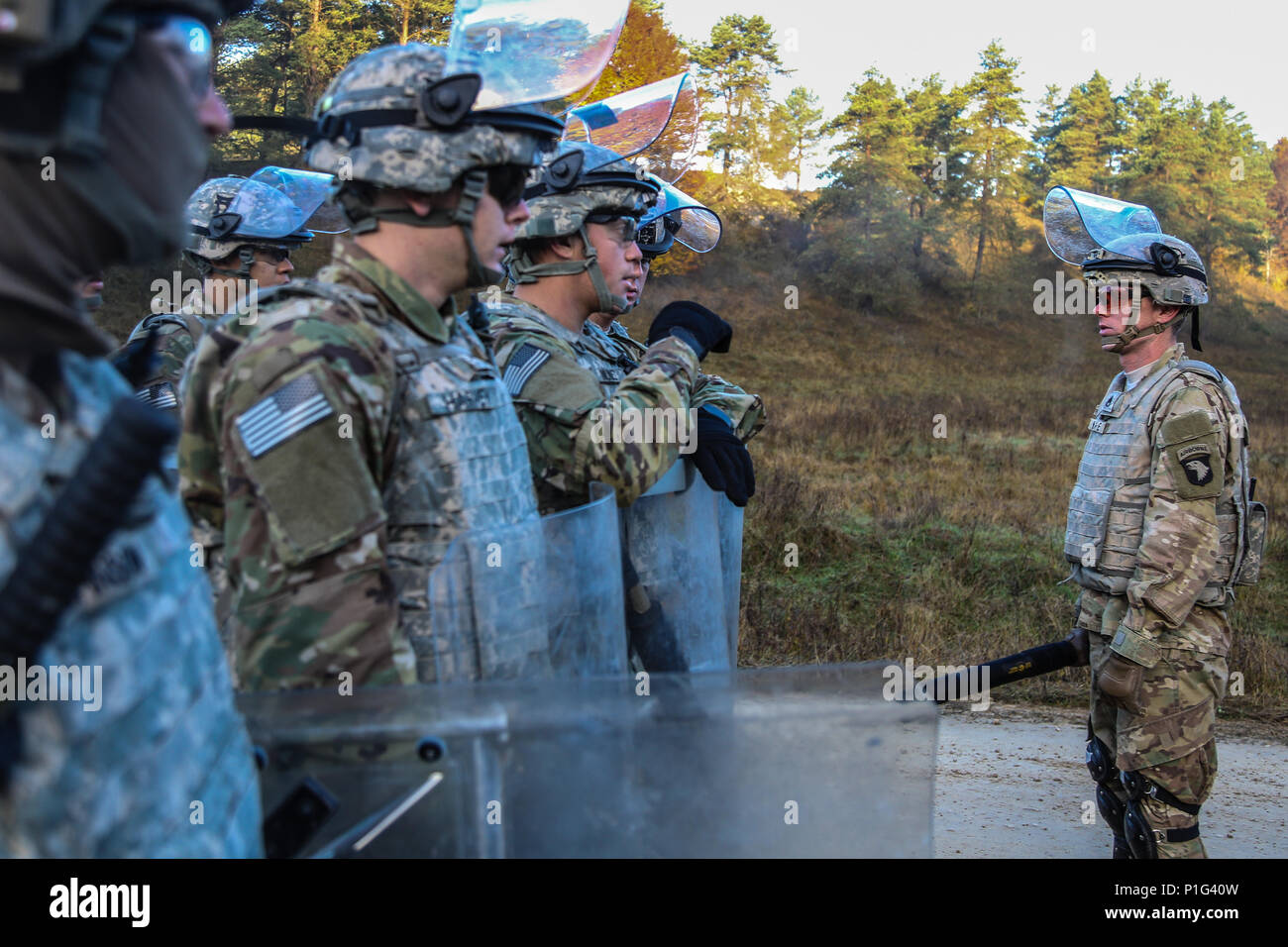A U.S. Soldier, right, of 1st Squadron, 33rd Cavalry Regiment, 3rd ...