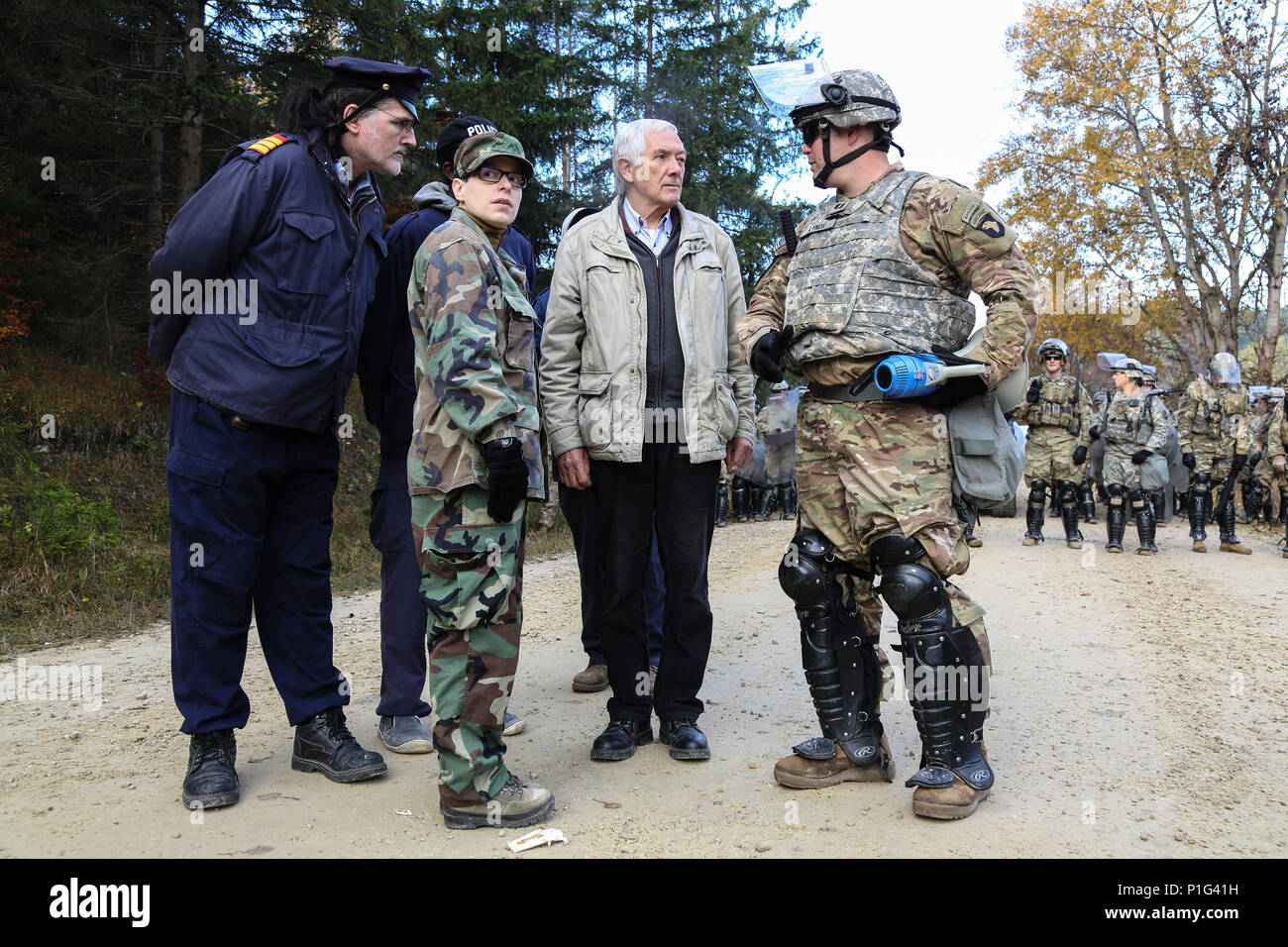 A U.S. Soldier, right, of 1st Squadron, 33rd Cavalry Regiment, 3rd ...