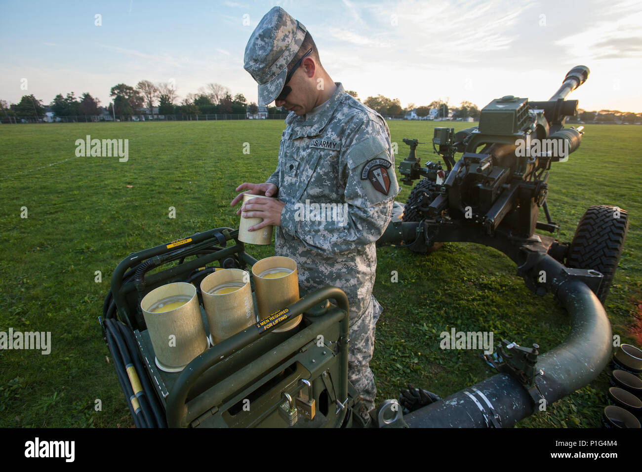 Spc. Joseph Dimaio, A Battery, 3-112th Field Artillery, checks 105mm ...