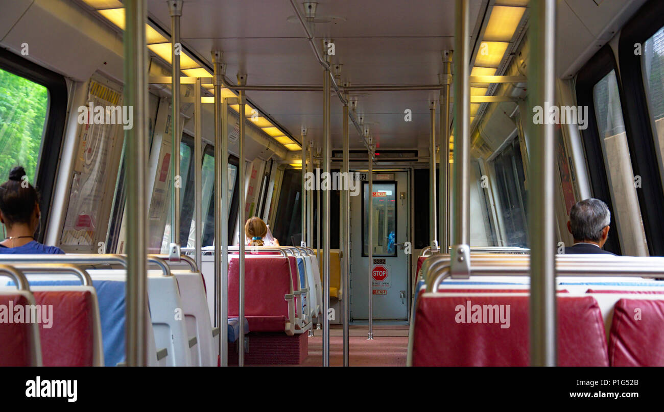 People riding metro train in Washington DC metro area Stock Photo - Alamy