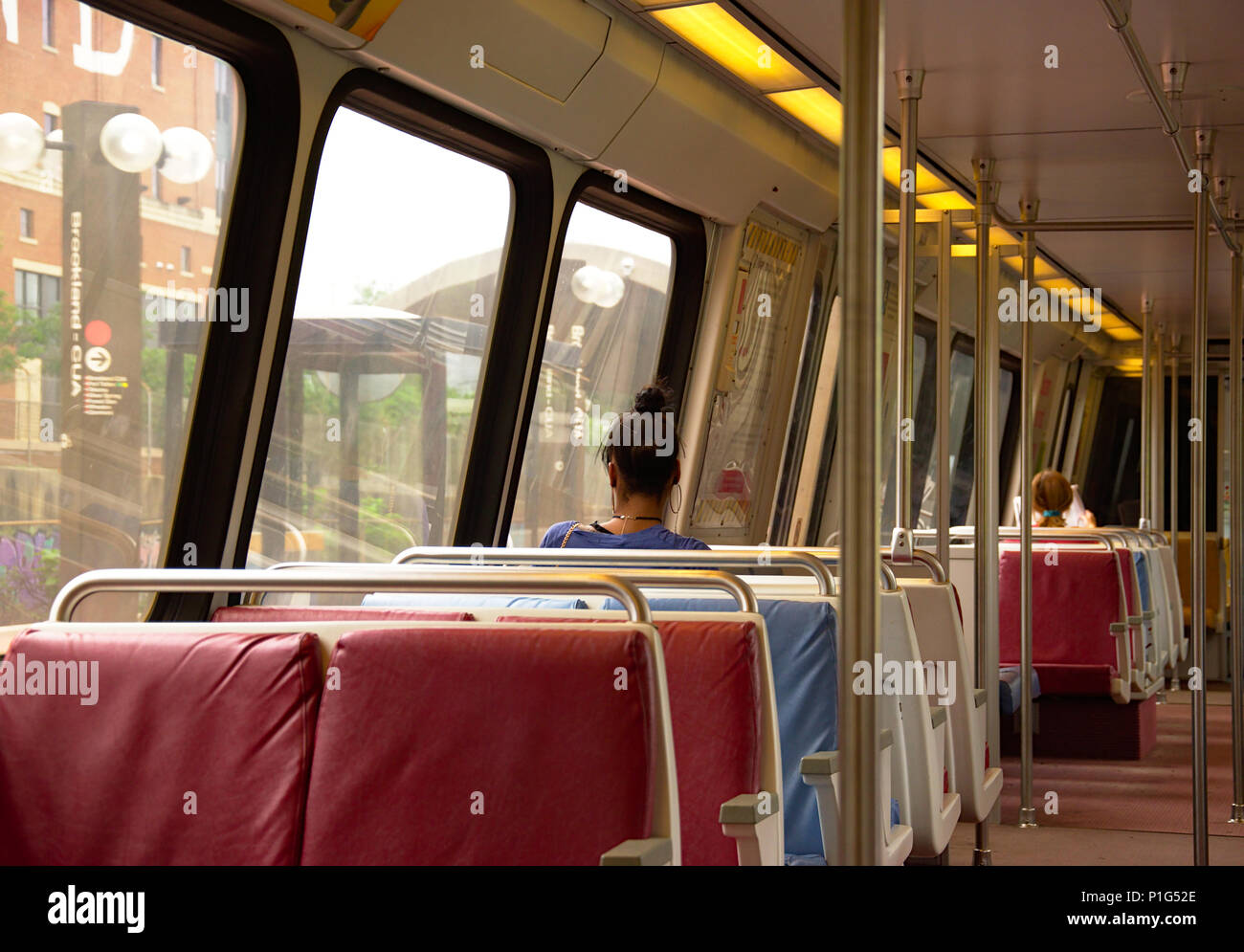 People riding metro train in Washington DC metro area Stock Photo - Alamy