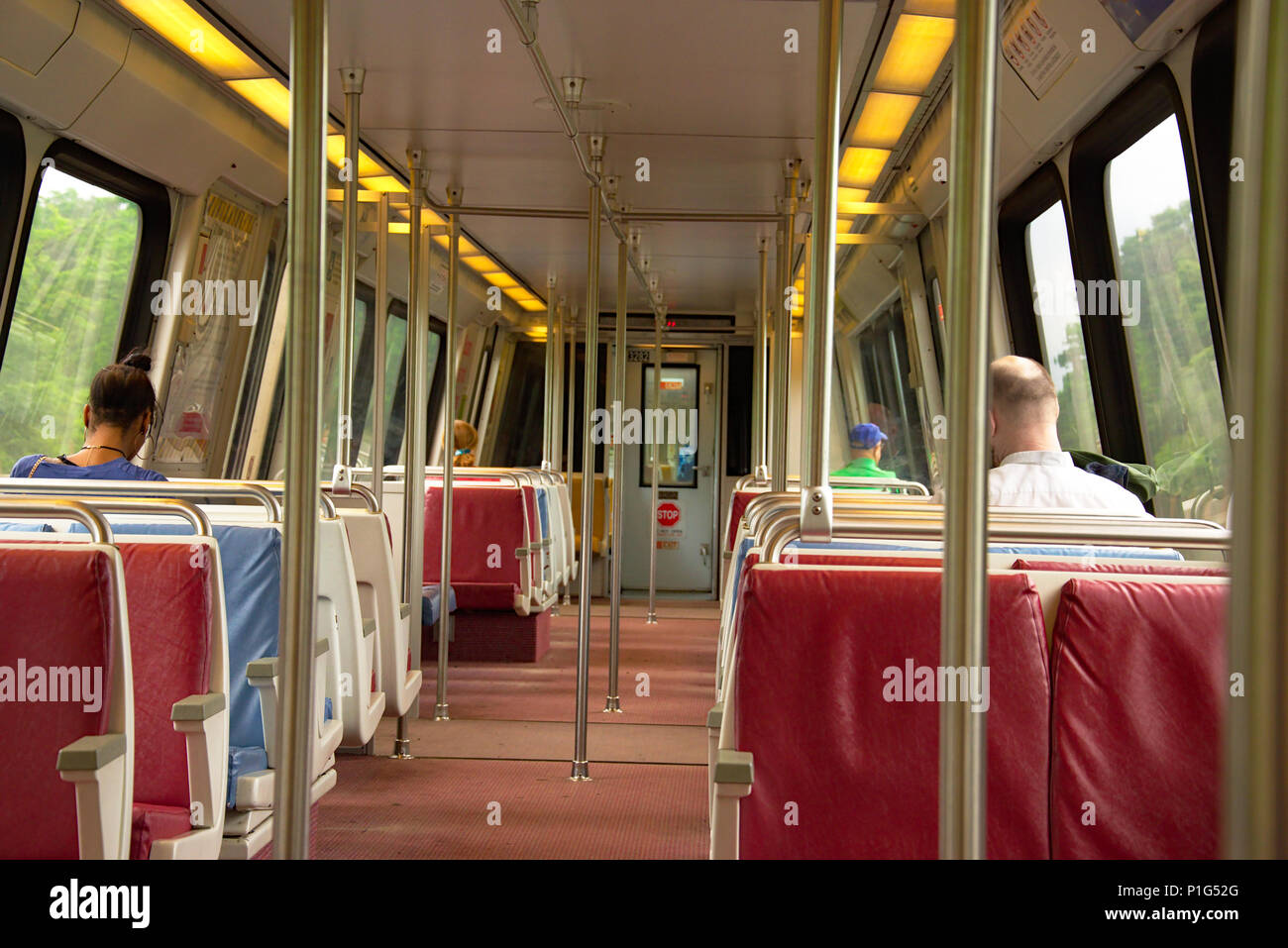 People riding metro train in Washington DC metro area Stock Photo - Alamy