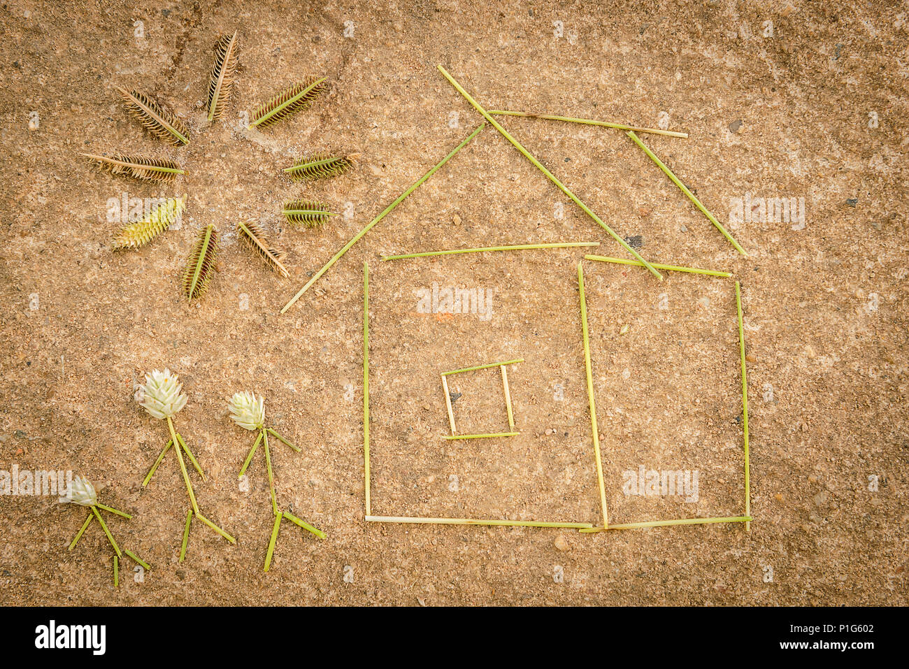 Grass house on the ground, Dream house success concept Stock Photo - Alamy