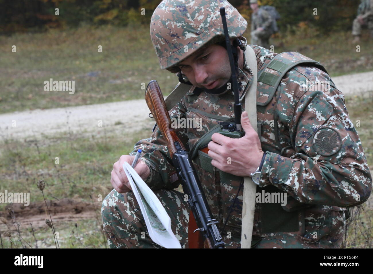 An Armenian soldier of the Armenian Peace Keeping Brigade transmits a ...