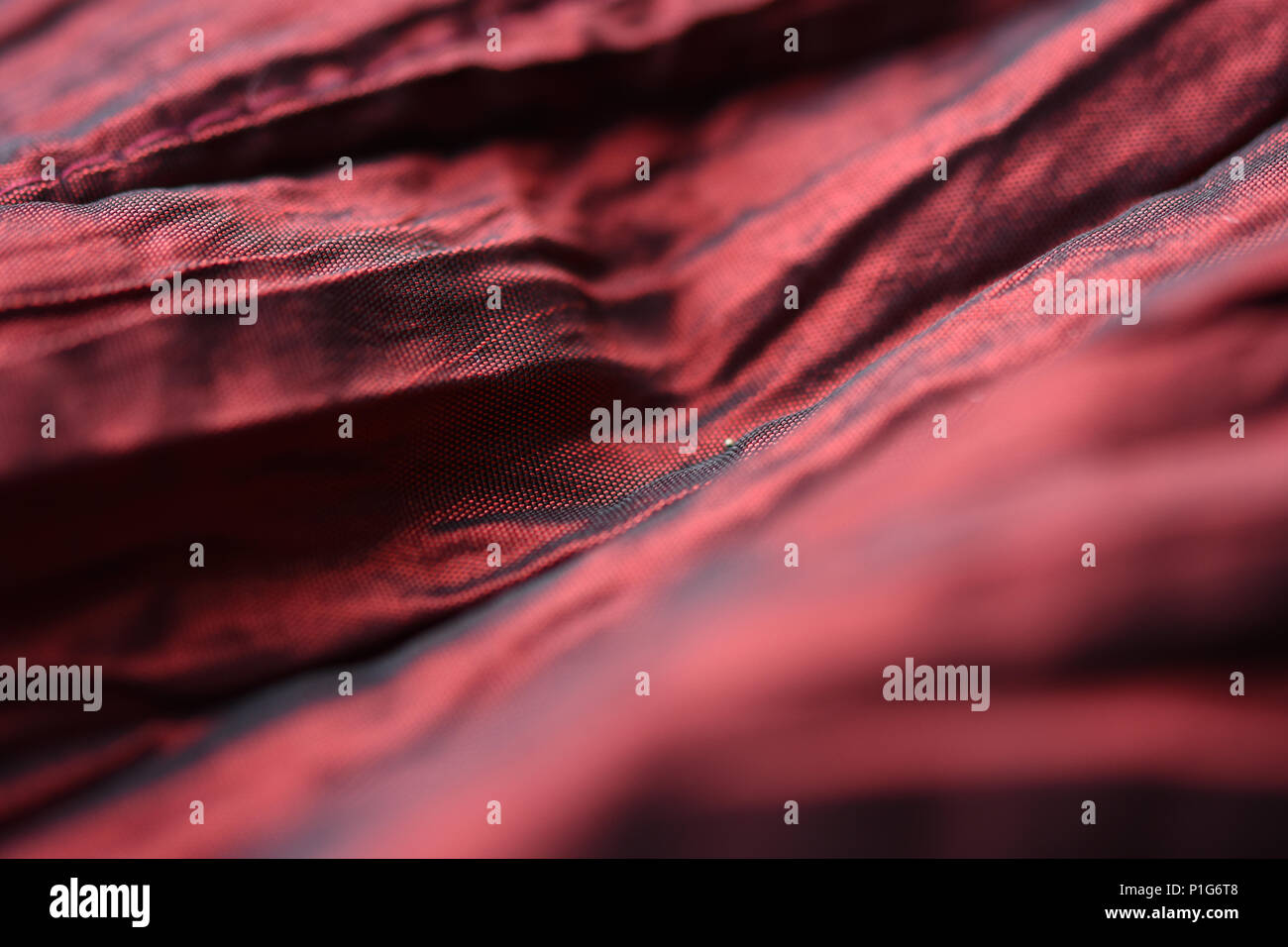 Crimson fabric hi-res stock photography and images - Alamy