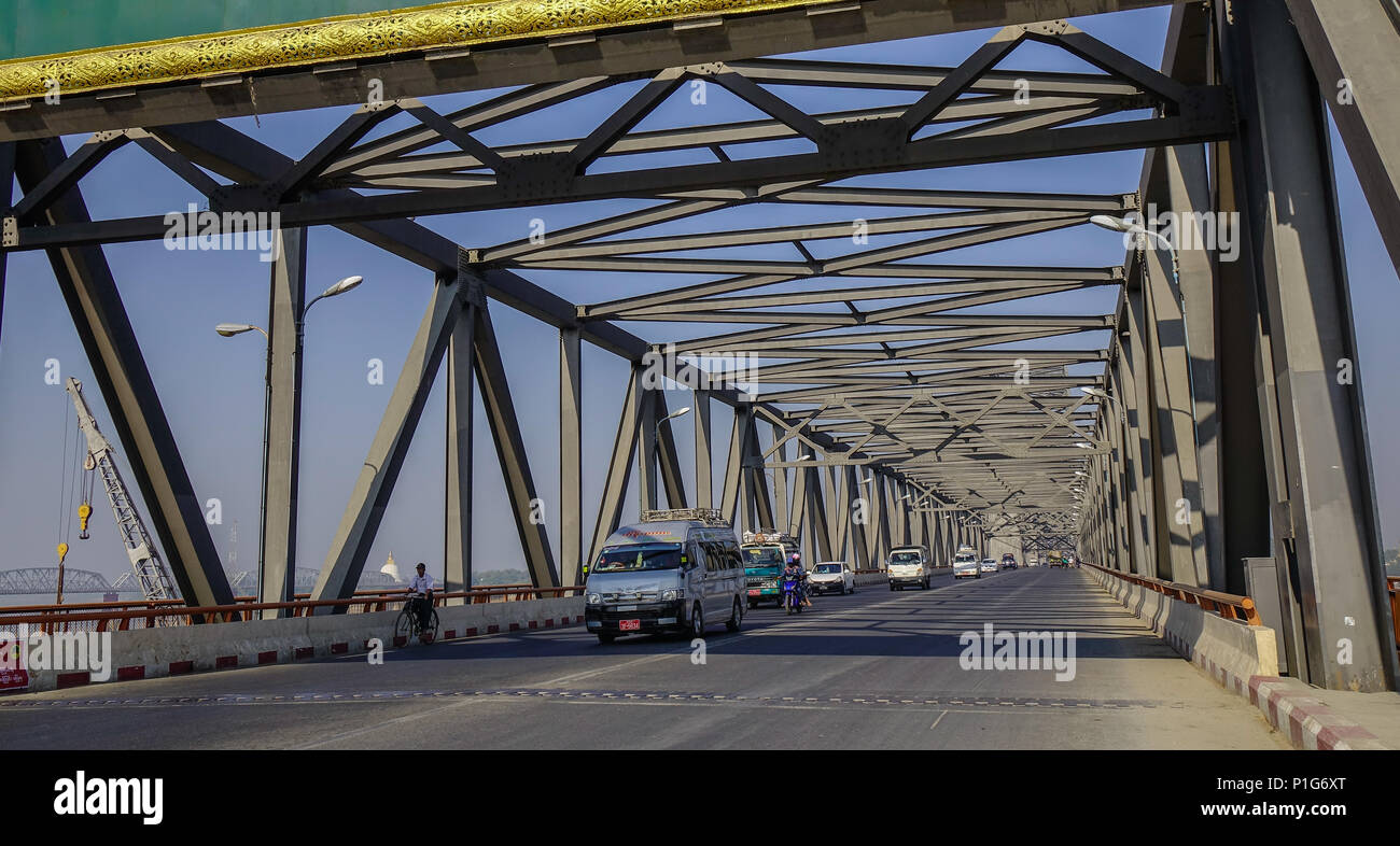 Mandalay, Myanmar - Feb 10, 2017. Steel bridge over the Irrawaddy river ...
