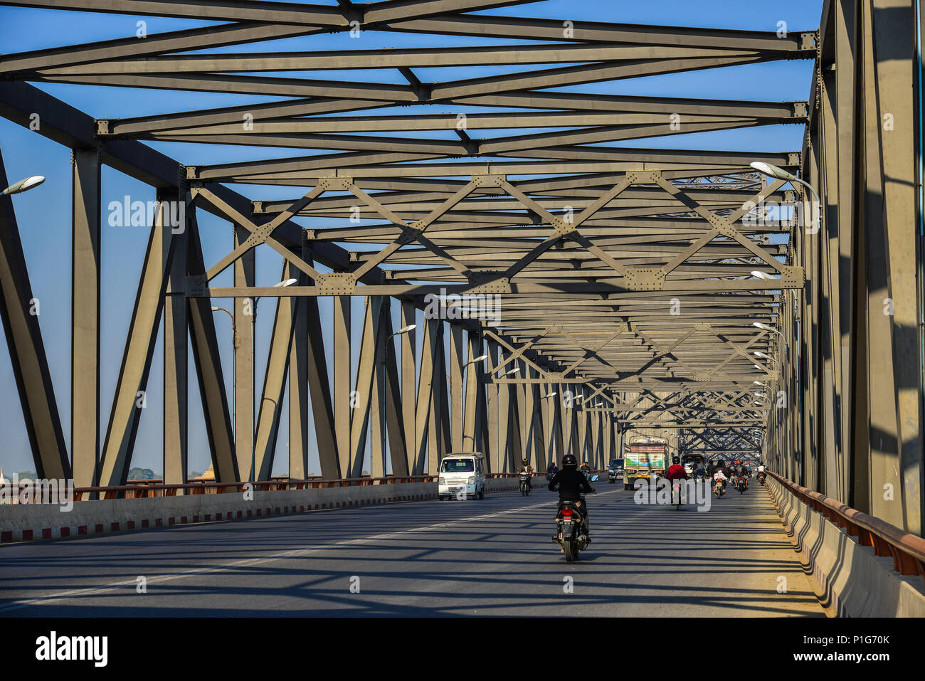 Mandalay, Myanmar - Feb 10, 2017. Steel bridge over the Irrawaddy river ...