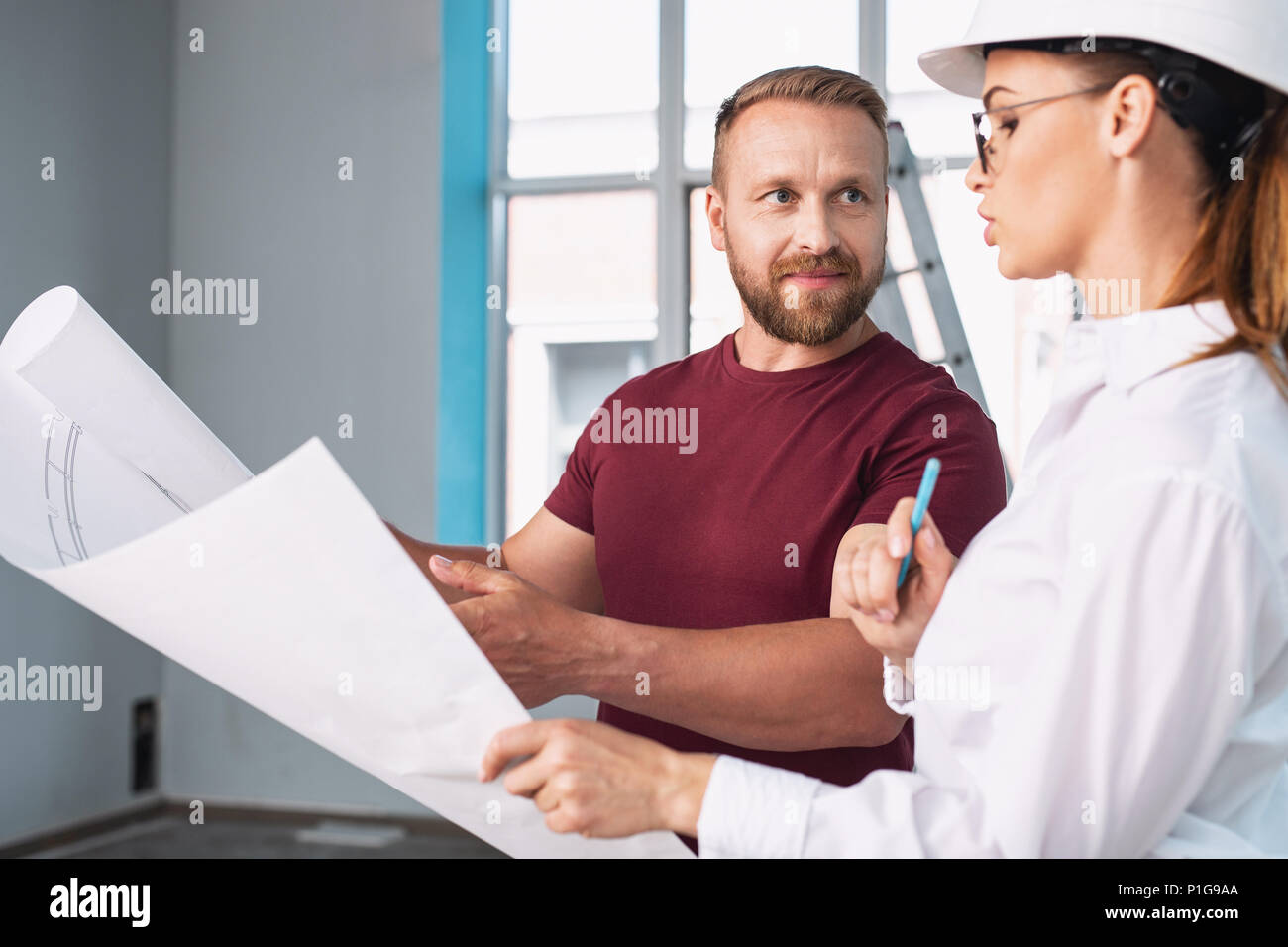 Serious man discussing his project Stock Photo - Alamy