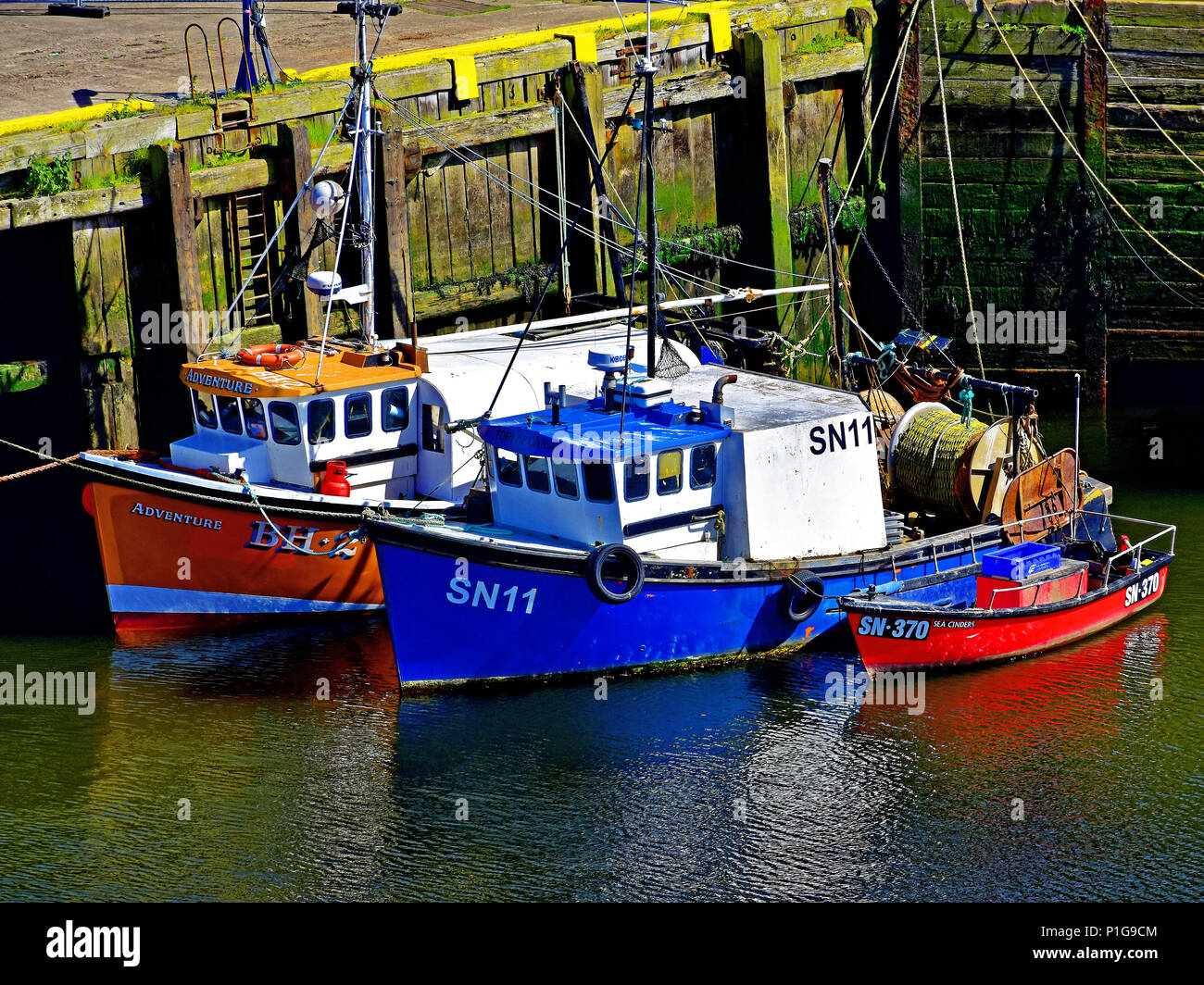 North Shields trio of fishing boats in harbour Stock Photo - Alamy