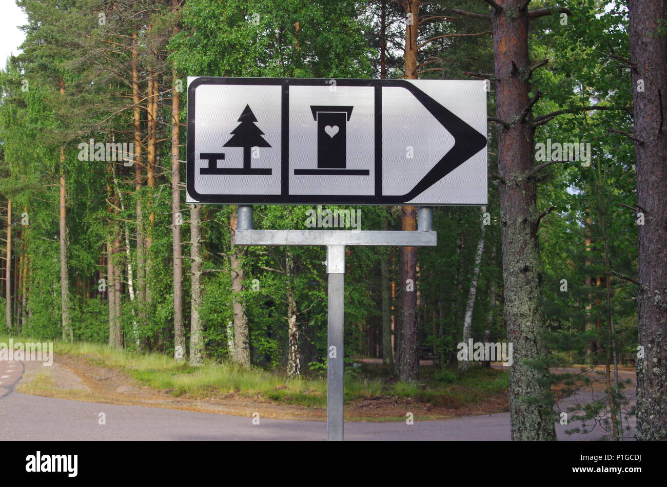 Road sign pointing to a rest area in Dalarna Stock Photo - Alamy