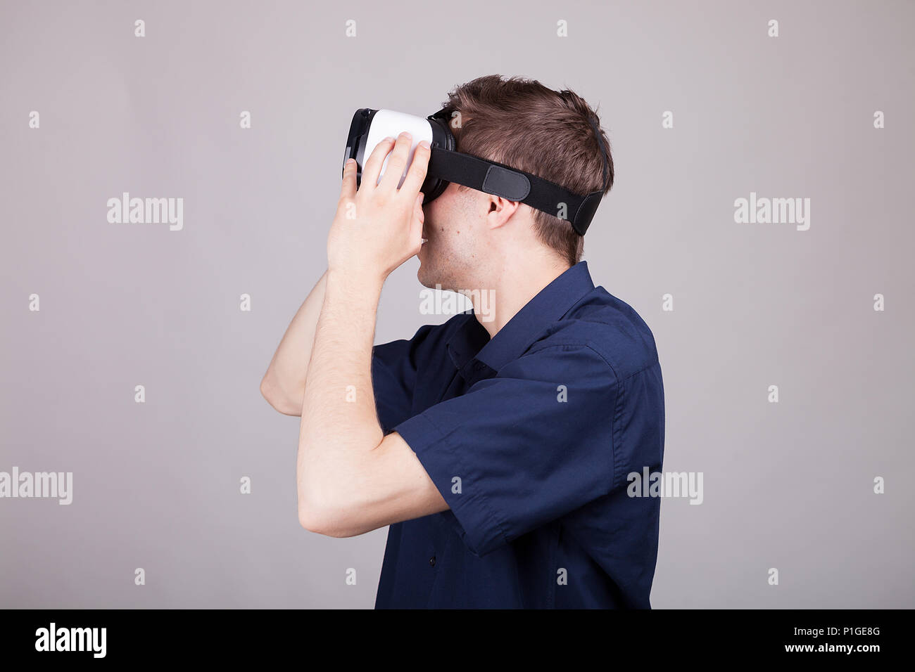 Young man wearing a VR headset Stock Photo - Alamy