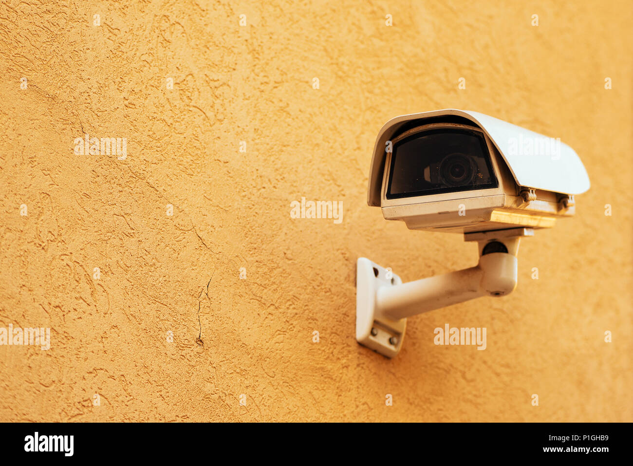 Cctv camera on wall hi-res stock photography and images - Alamy