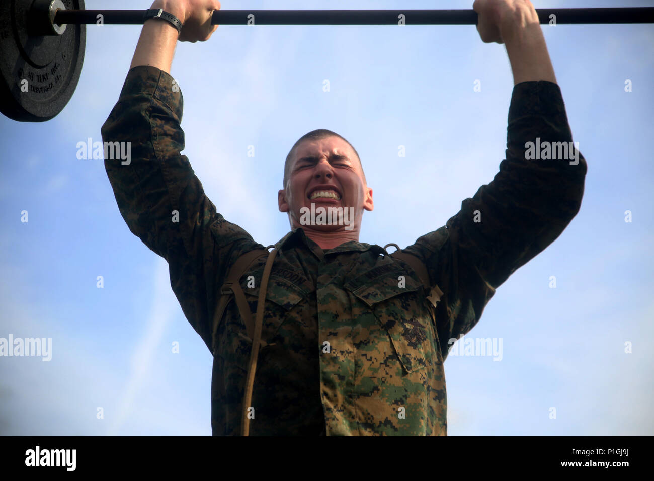 Pfc. Peter Persoon completes an overhead press during the unit’s Raider ...