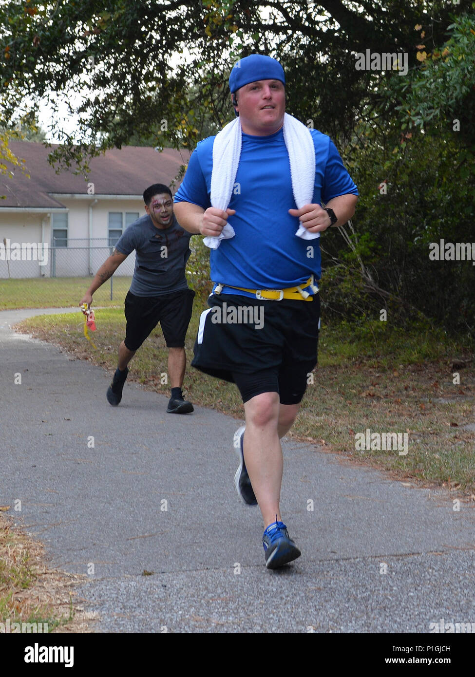 Sean Mullaney runs from zombiefied Air Commandos during the Fear the ...
