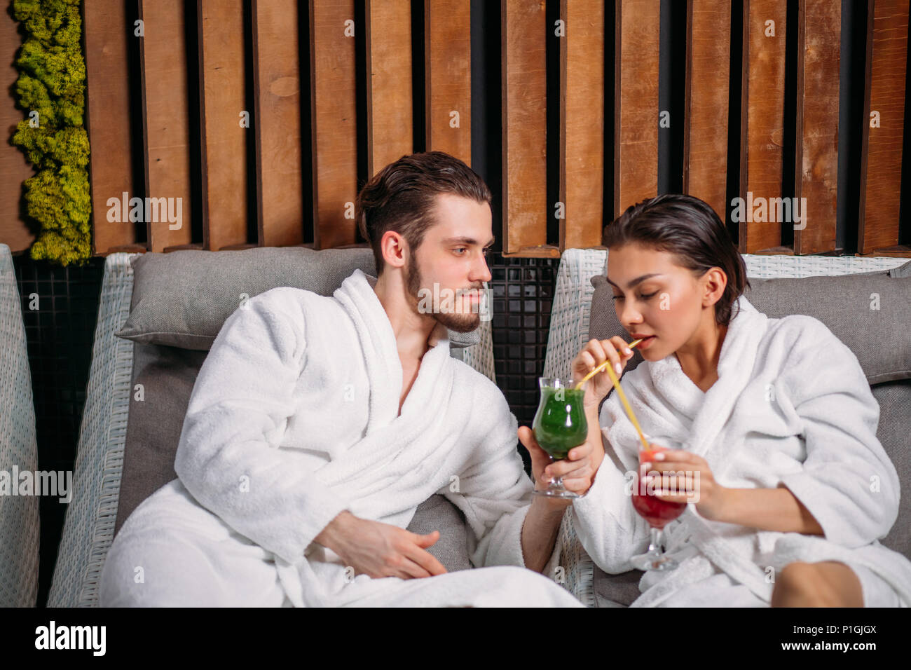 Young woman enjoying refreshments hi-res stock photography and images ...