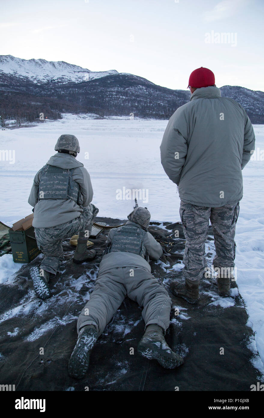 Airmen assigned to the 673rd Security Forces Squadron, conduct M240B ...