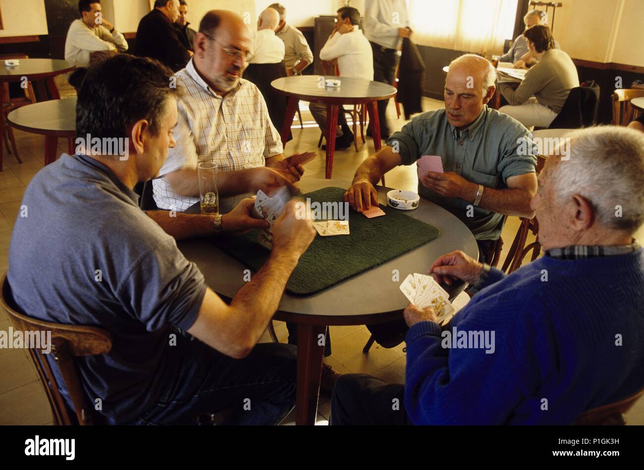 La Ametlla de Merola; colonia textil; bar y gente jugando a la ...