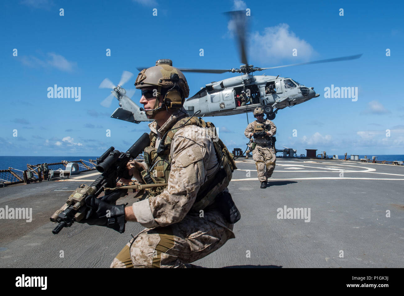 Members of explosive ordnance disposal mobile unit eodmu 5 hi-res stock ...