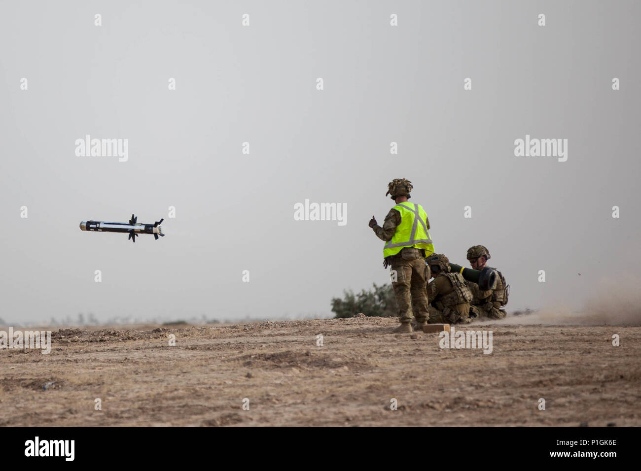 Australian soldiers from Training Task Unit, Task Group Taji 3 fire a ...