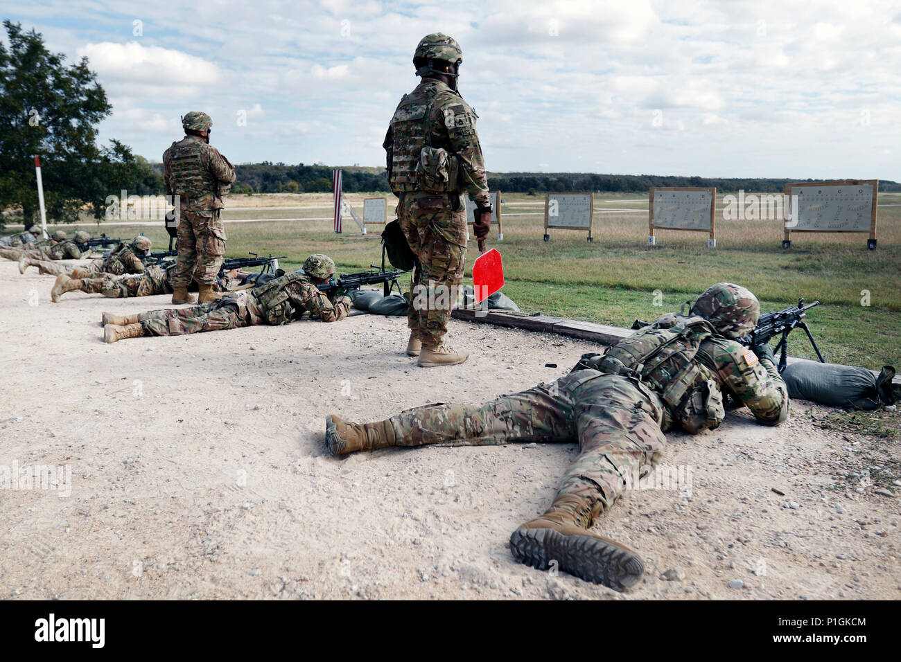 316th Sustainment Command (Expeditionary) Soldiers, fire the M249 Light ...