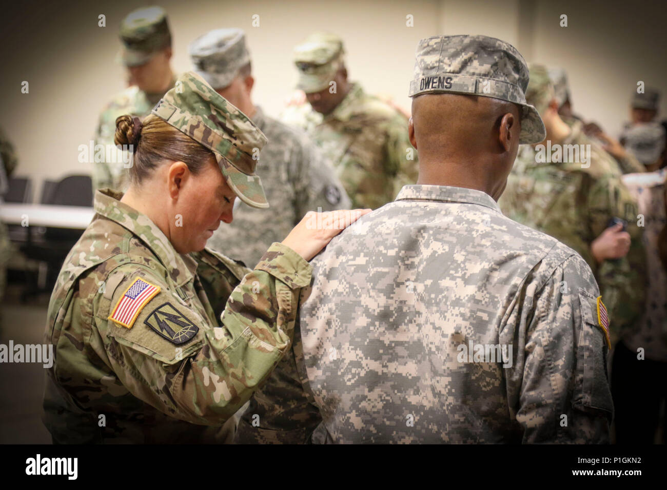 Col. Nikki Olive-Griffin (left), deputy commanding general of ...