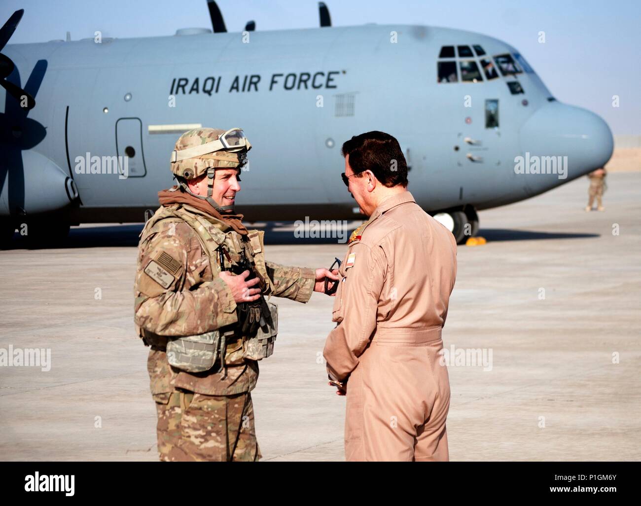U.S. Air Force Col. Rhett Champagne, left, commander, 821st Crisis ...