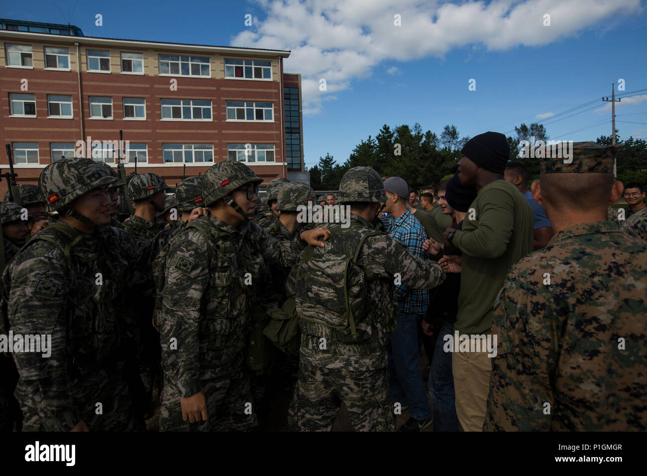 U.S. Marines with Lima Company, 3rd Battalion 2nd Marines, instruct ...