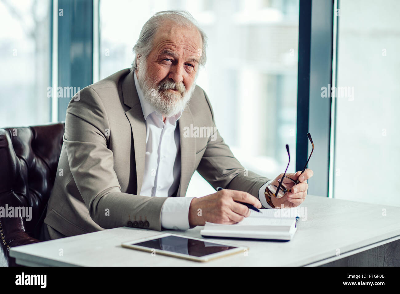 closeup side view portrait of talented handsome senior boss in stylish ...