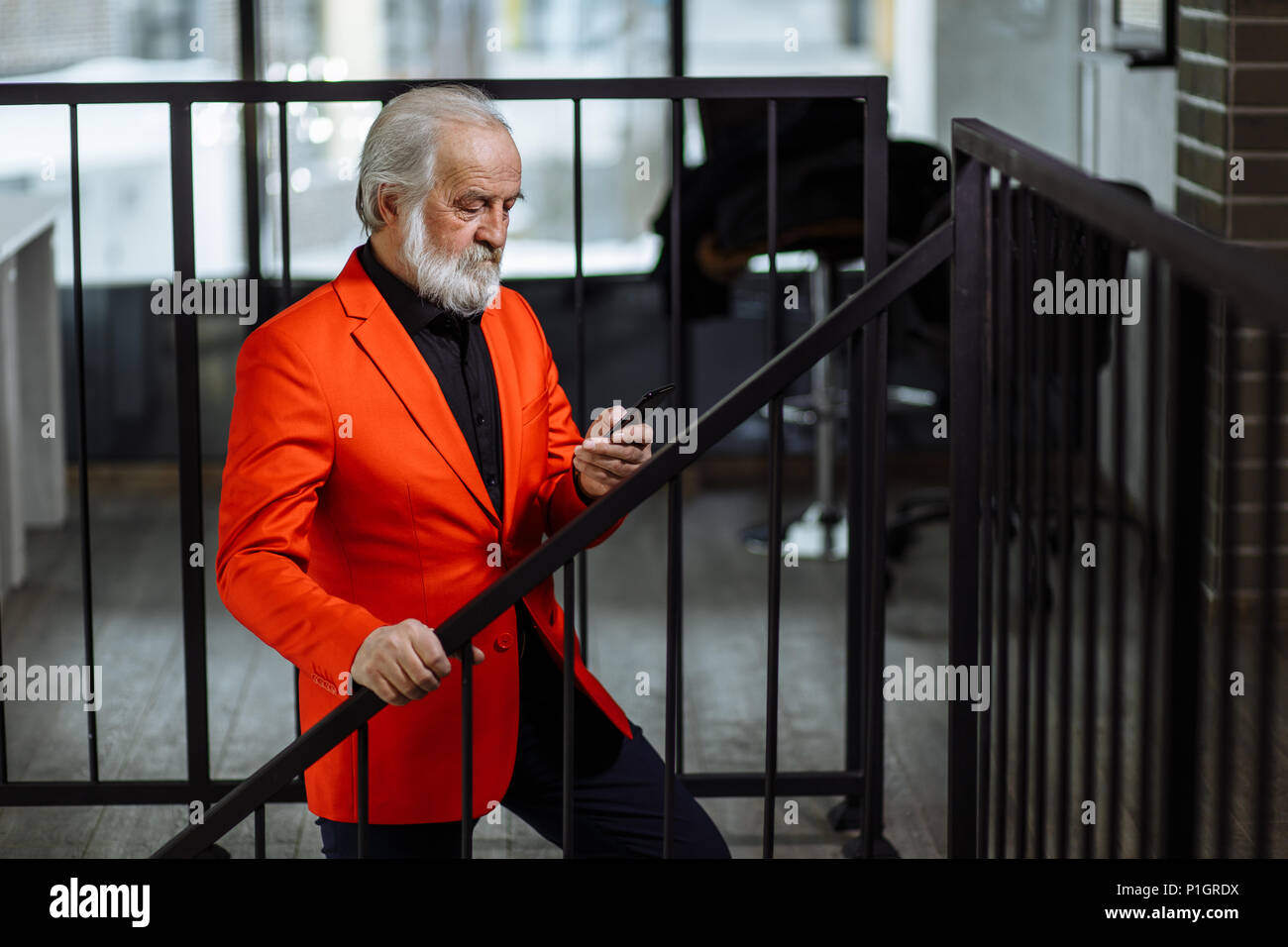 Senior man climbing stairs hi-res stock photography and images - Alamy