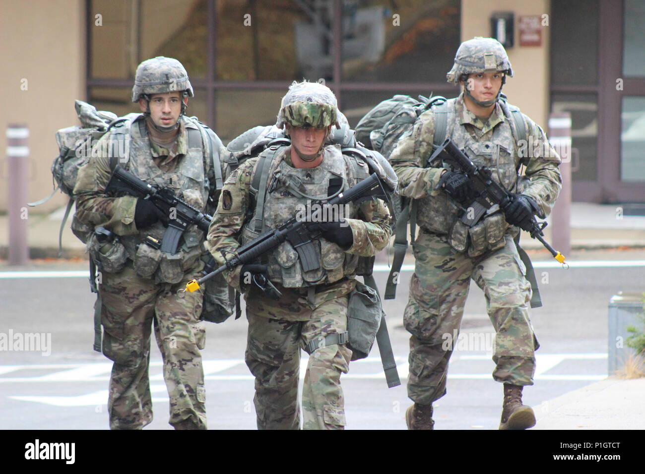 Sgt. Robert Dingle (center), 1st Lt. Nathanael Agront (left) and Pfc ...