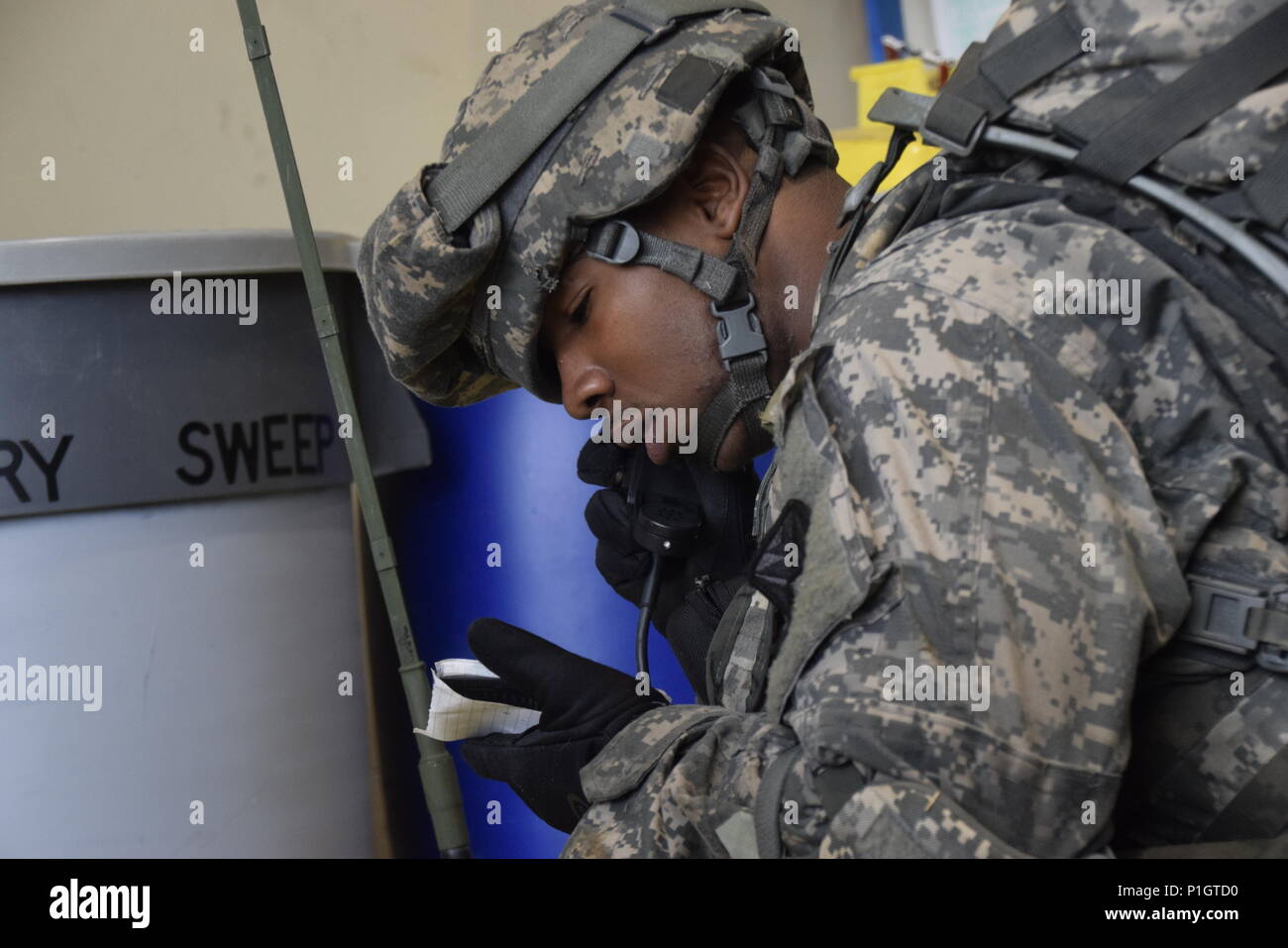Spc. Marquee Massie, HHB, 6-52 ADA Battalion, calls in a 9-line MEDEVAC ...