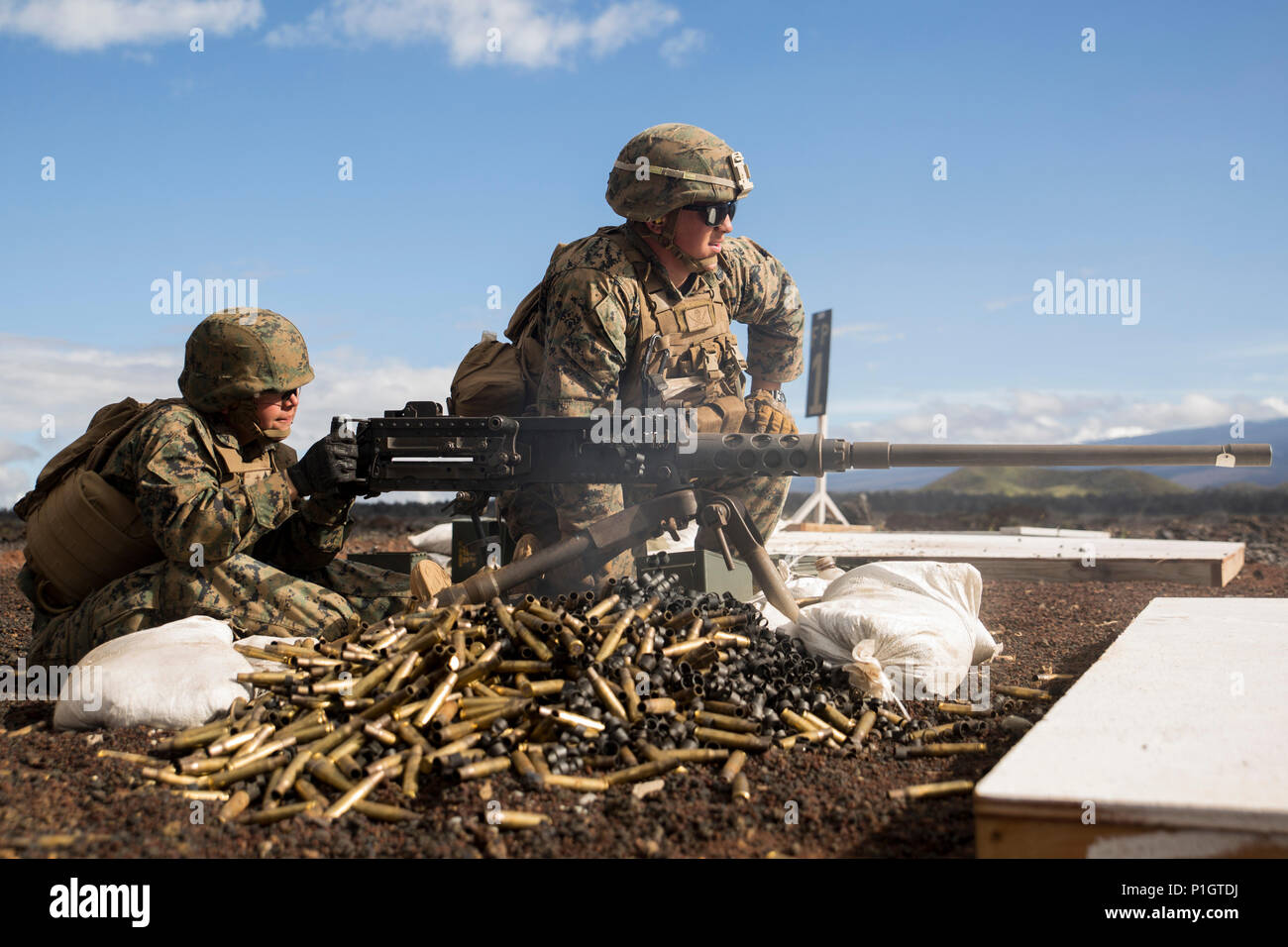 POHAKULOA TRAINING AREA, Hawaii – Lance Cpl. Lauren Bell (left), a ...
