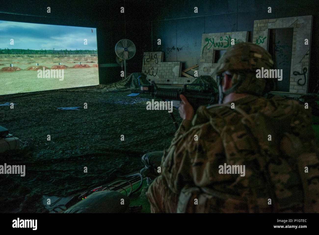 U.S. Army Spc. Reglieo Hernandez, assigned to 5th Detachment, 603rd ...