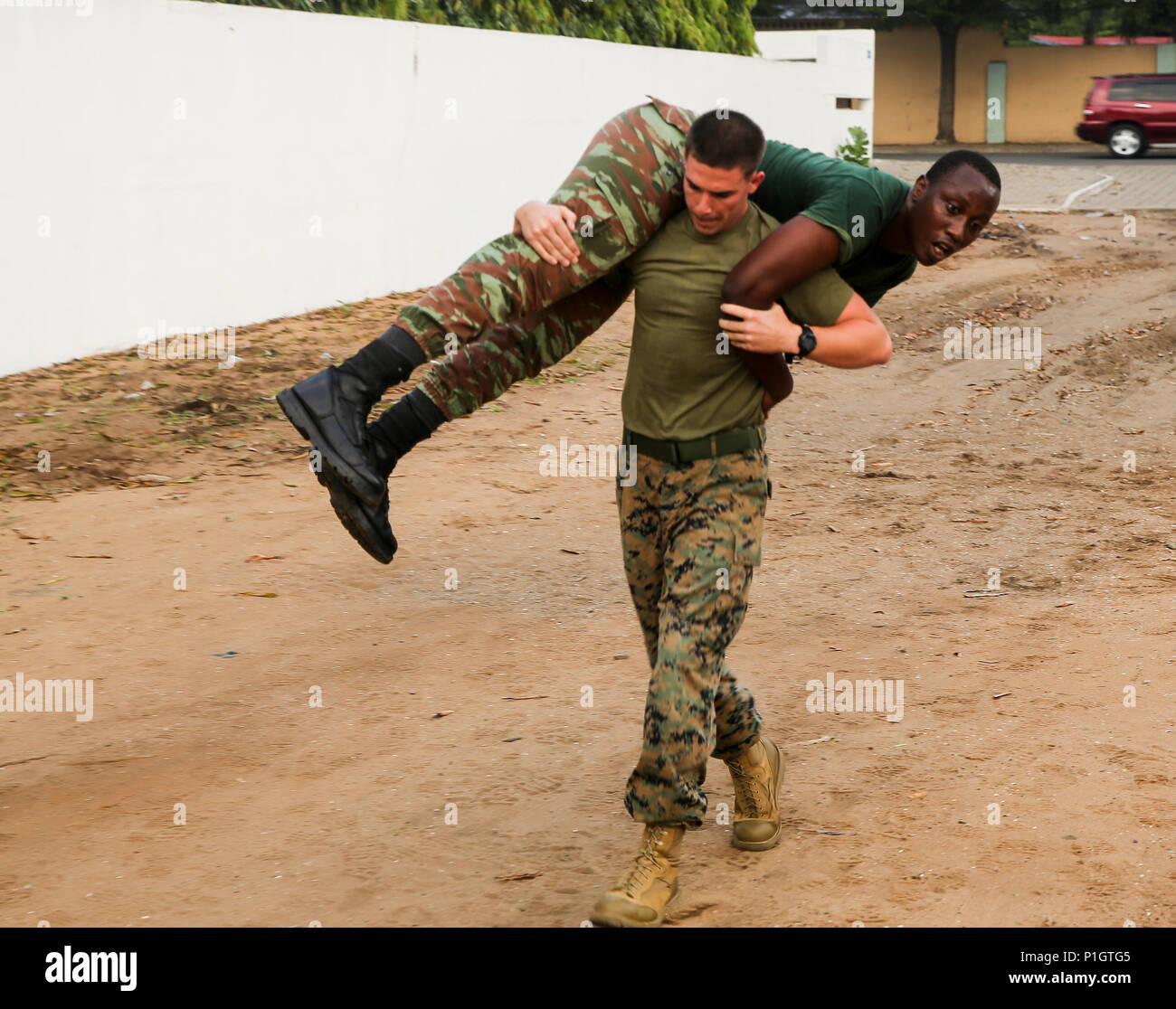 Fireman carry hi-res stock photography and images - Alamy