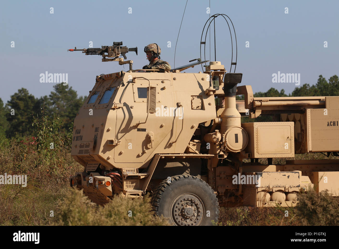 FORT BRAGG, N.C--A HIMARS crewmember scans the perimeter during the ...