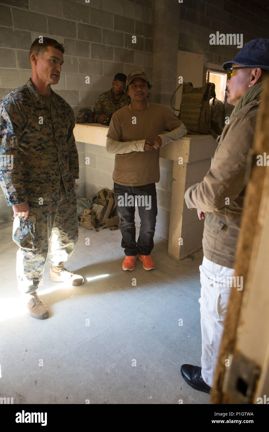 U.S. Marine Corps Cpt. Kelly M. Candies, left, infantry officer, Lima ...