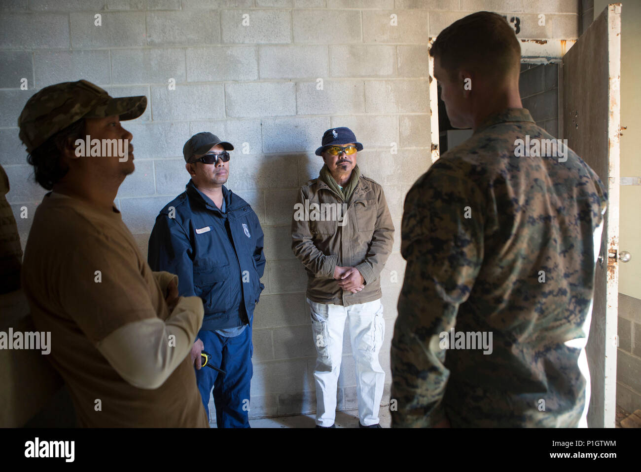 U.S. Marine Corps Cpt. Kelly M. Candies, left, infantry officer, Lima ...