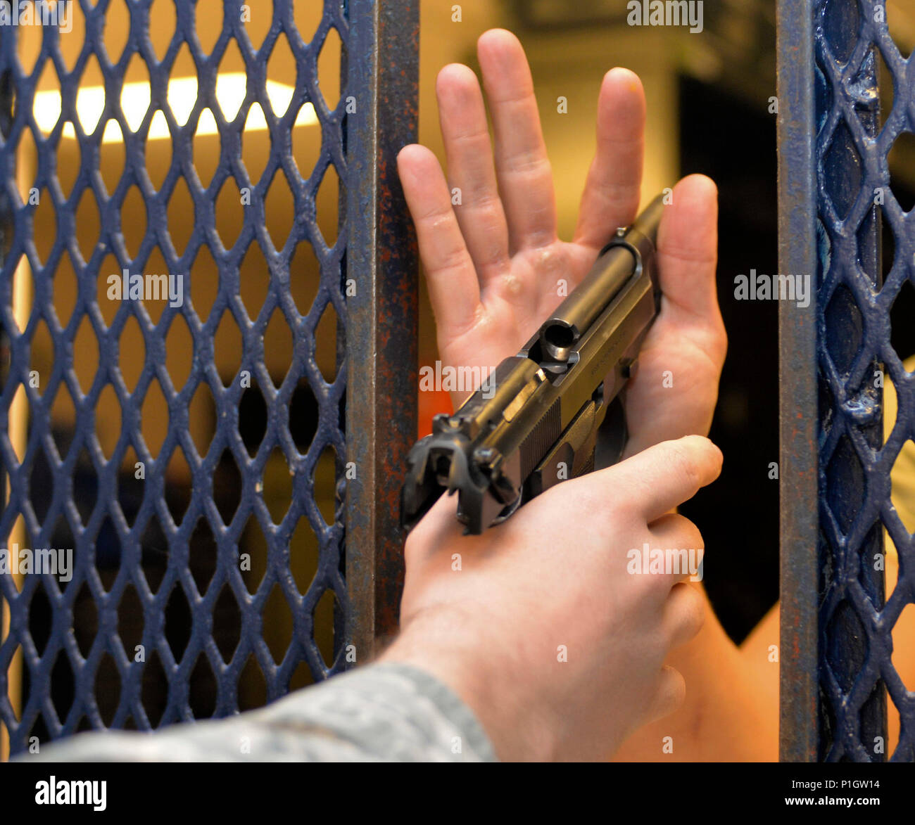 An armorer assigned to the 28th Security Forces Squadron provides a ...