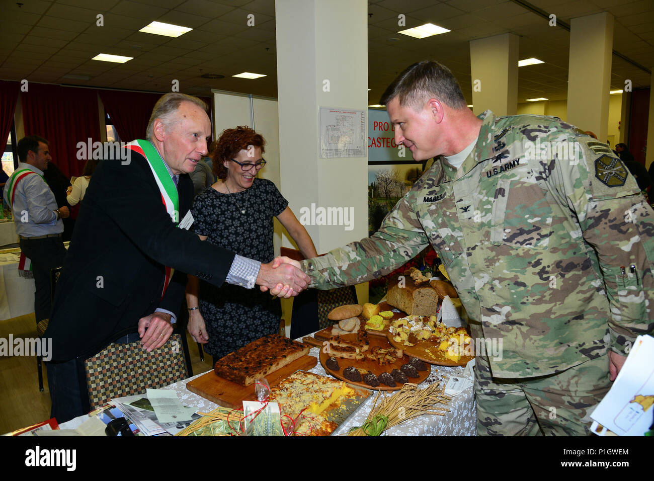 U.S. Army Col. Steve Marks, U.S. Army Garrison Italy commander, greets ...