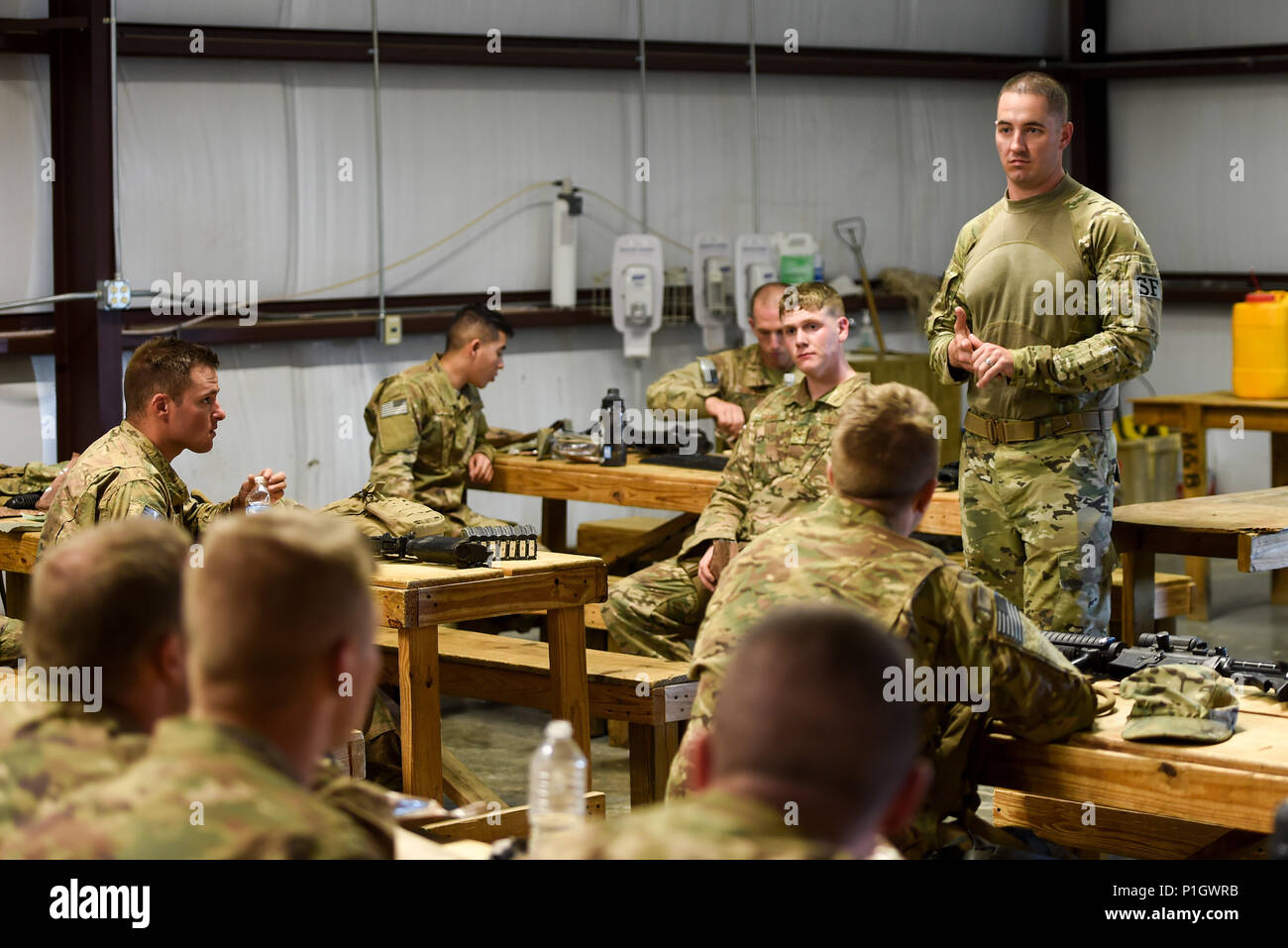 Capt. Justin May, the operations officer with the 1st Special ...