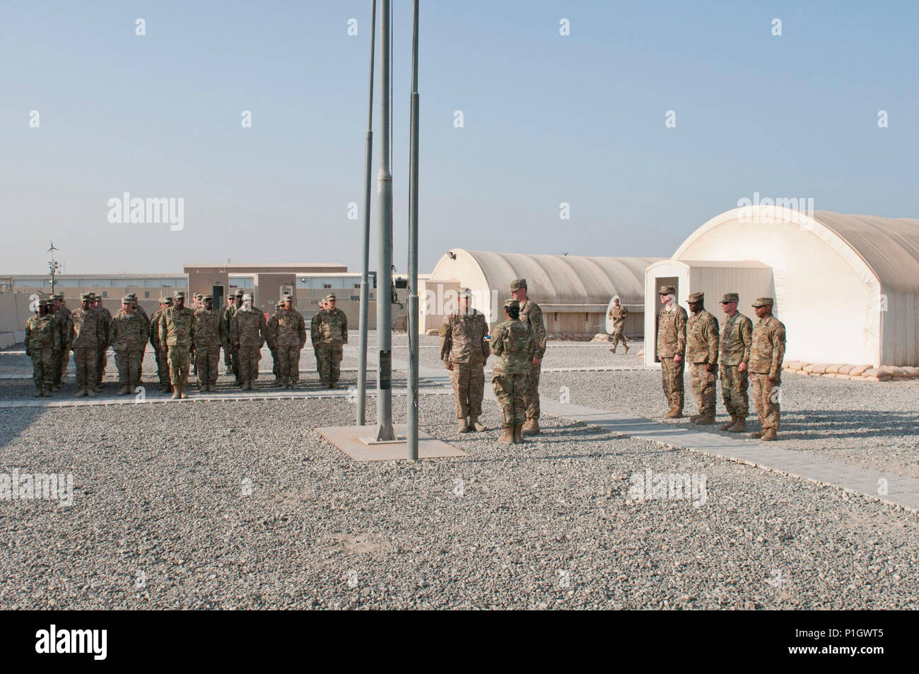 KUWAIT--The New York State Flag is raised at Camp Arifjan, Kuwait on ...
