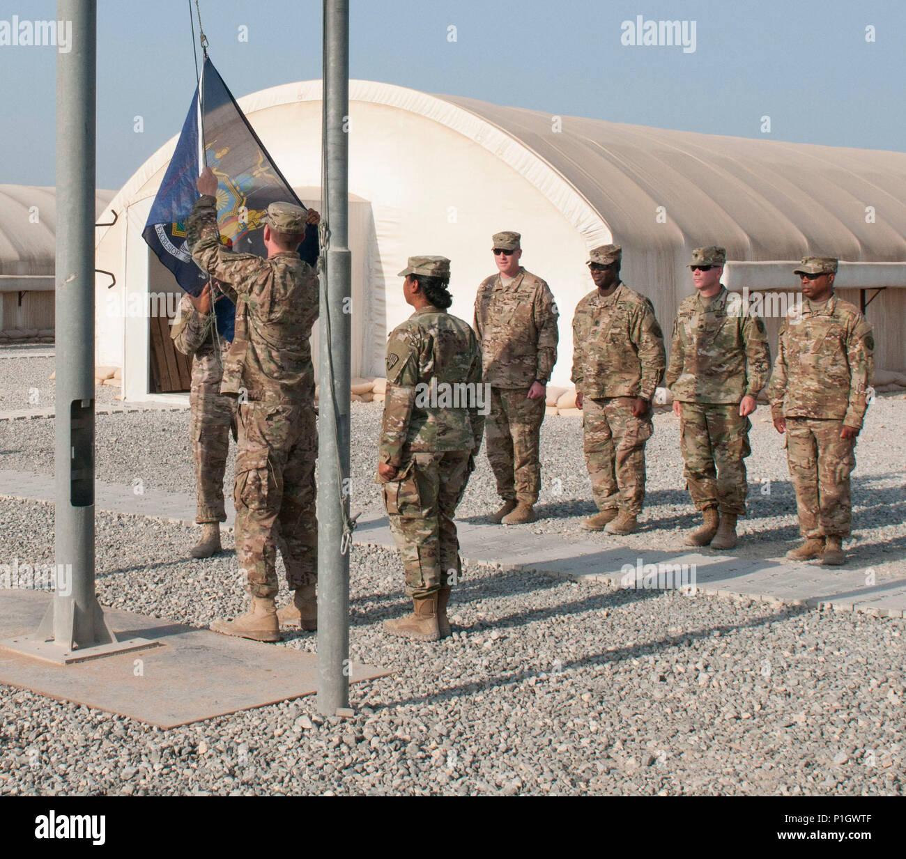 KUWAIT--The New York State Flag is raised at Camp Arifjan, Kuwait on ...
