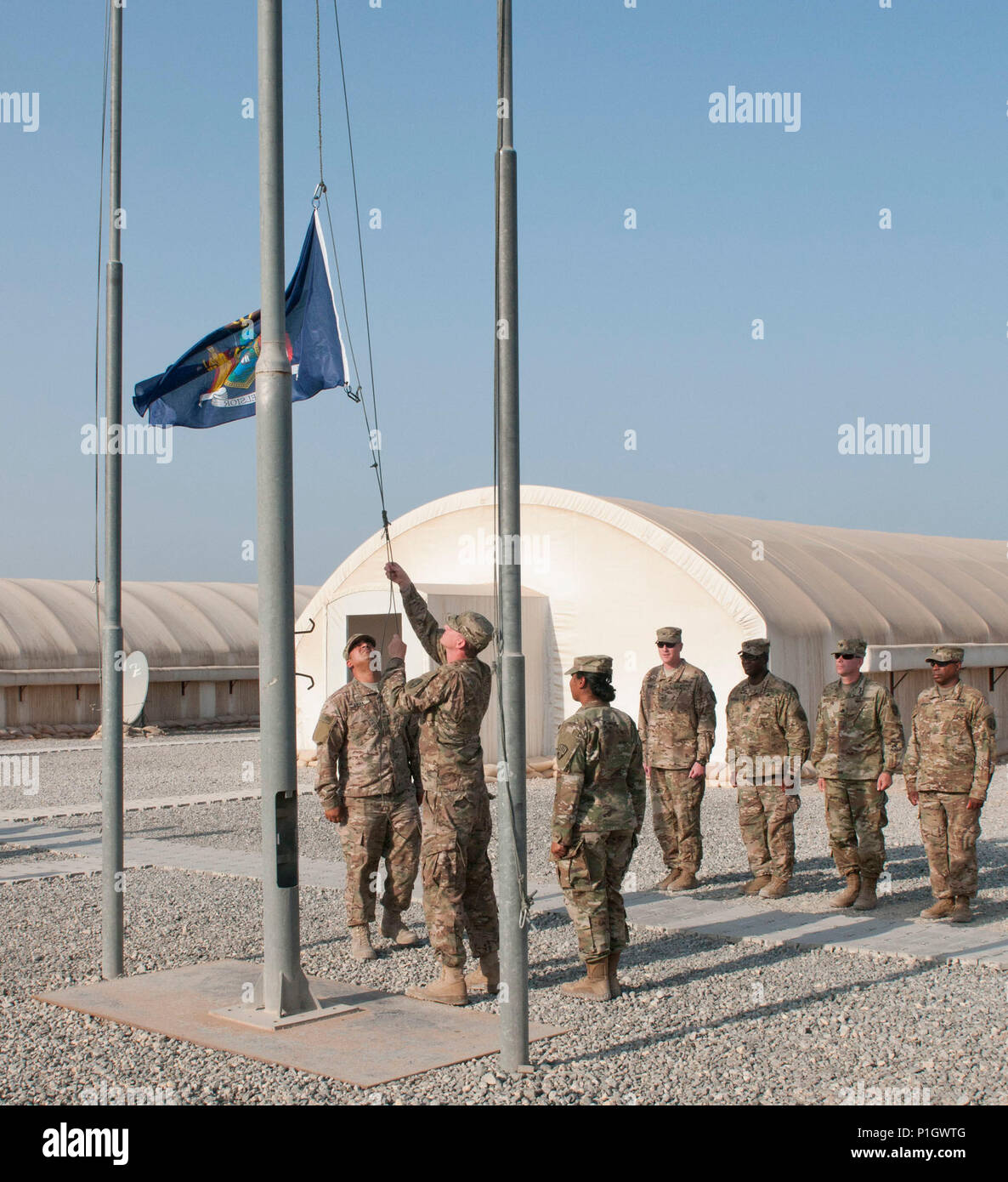 KUWAIT--The New York State Flag is raised at Camp Arifjan, Kuwait on ...
