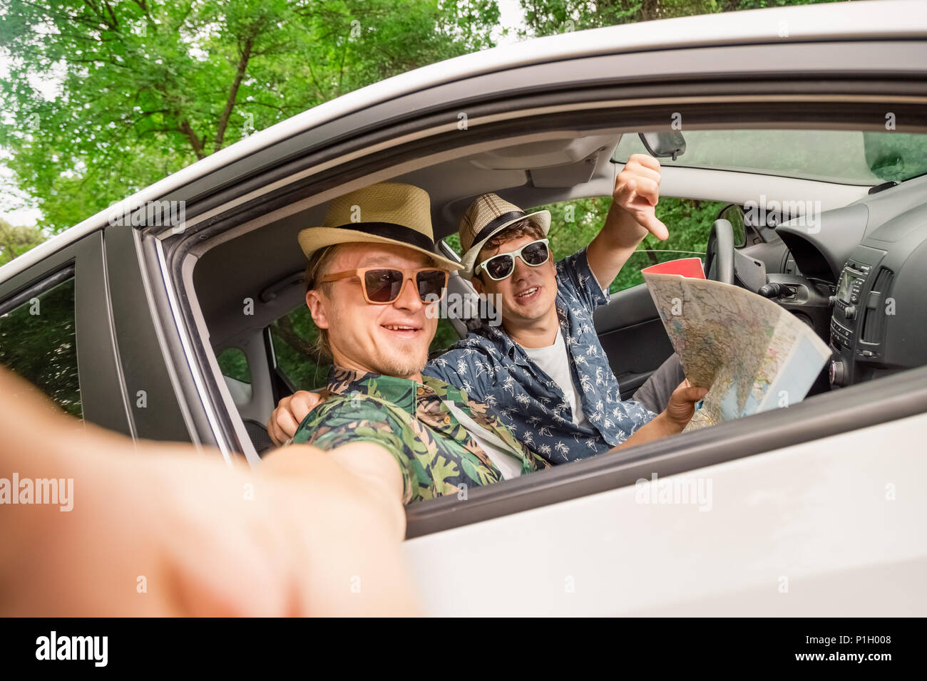 Two guys driving car hi-res stock photography and images - Alamy