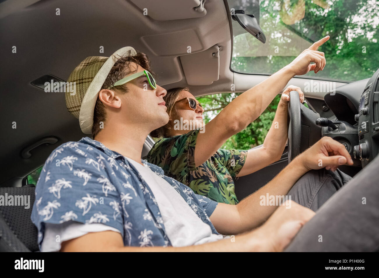 Two guys driving car hi-res stock photography and images - Alamy