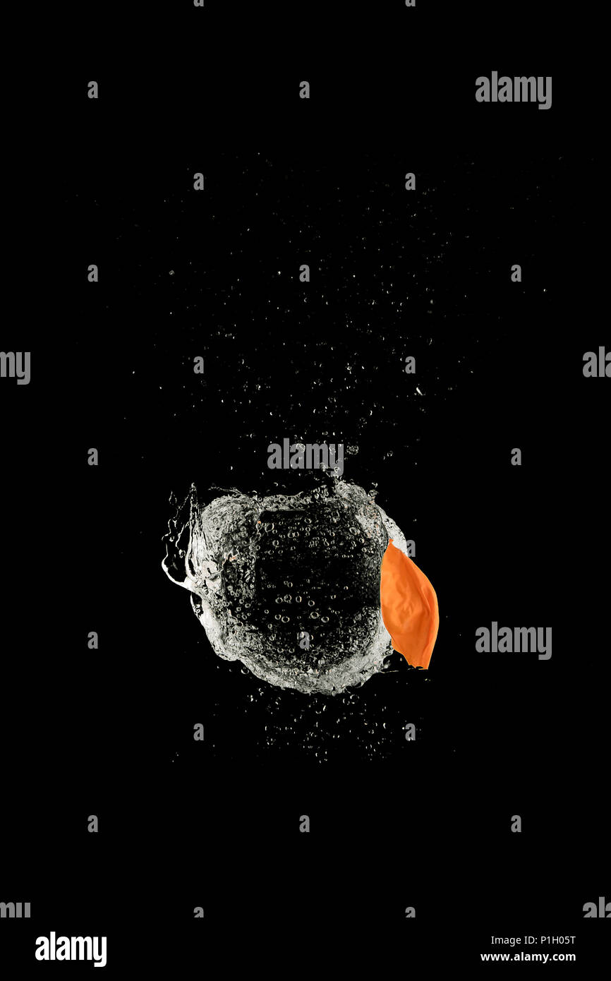 high-speed photograph of a balloon filled with exploding water Stock ...