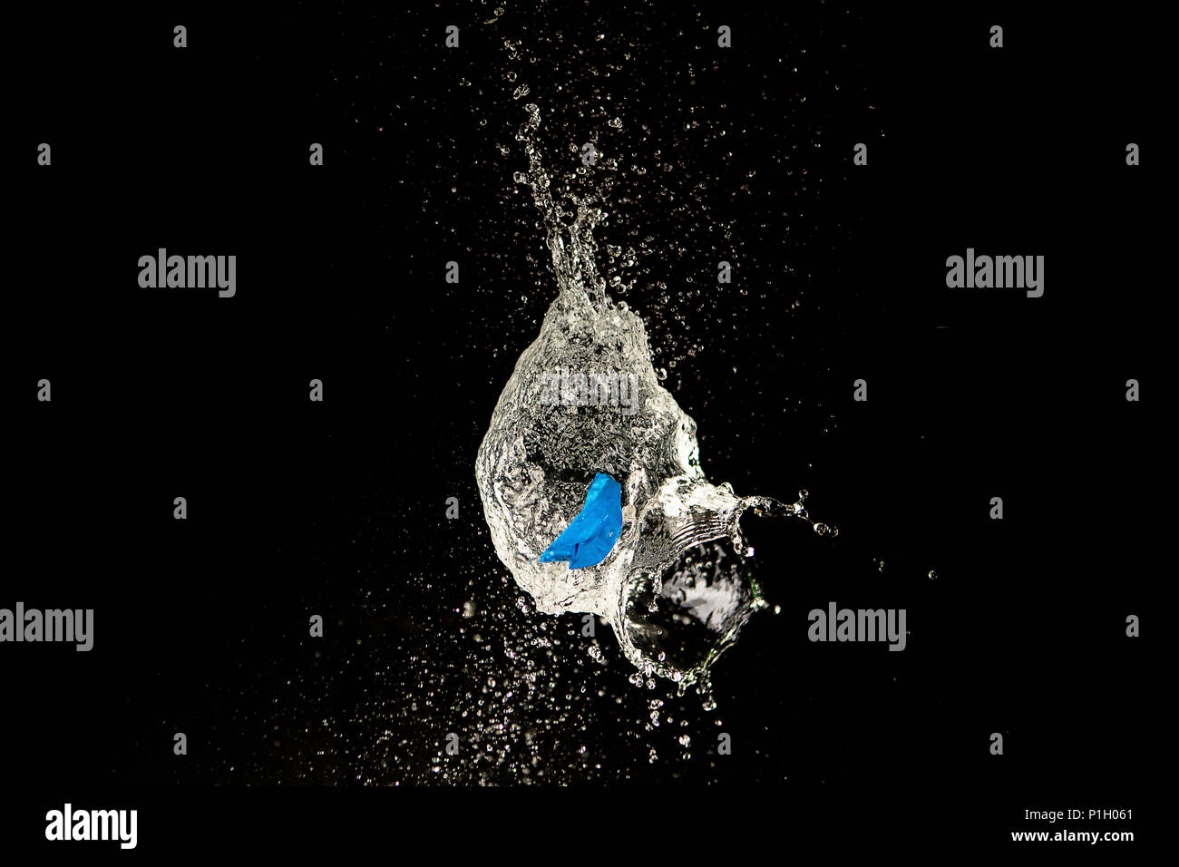 high-speed photograph of a balloon filled with exploding water Stock ...