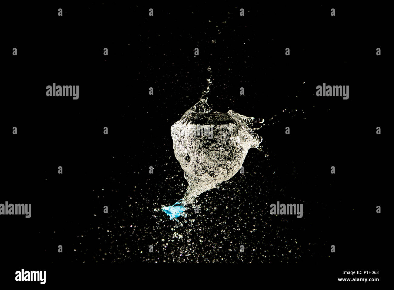 high-speed photograph of a balloon filled with exploding water Stock ...